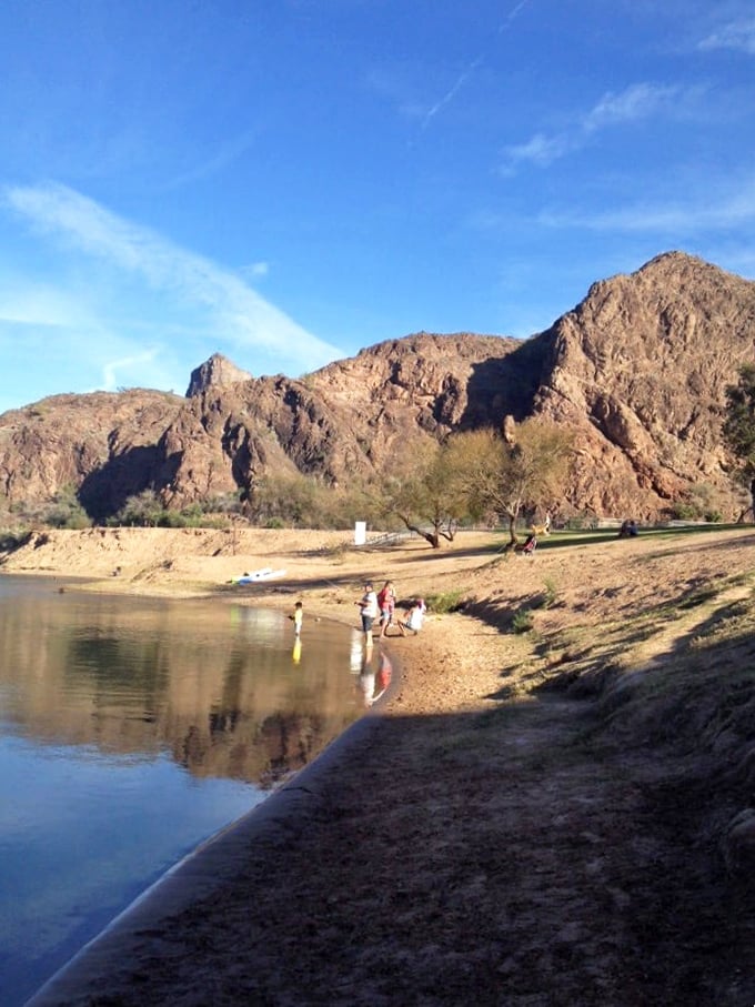 Morning light bathes the campground in golden hues, promising another perfect day in this unexpected desert paradise.