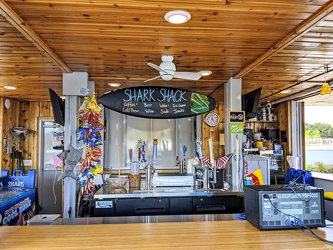 The Shark Shack serves as command central for refreshments, where sun-kissed adventurers refuel between aquatic conquests.