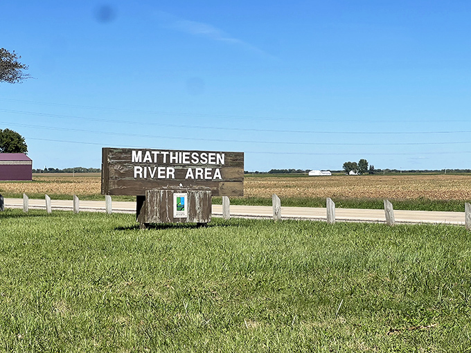 The unassuming entrance to Matthiessen River Area belies the natural wonders waiting just beyond that weathered wooden sign.