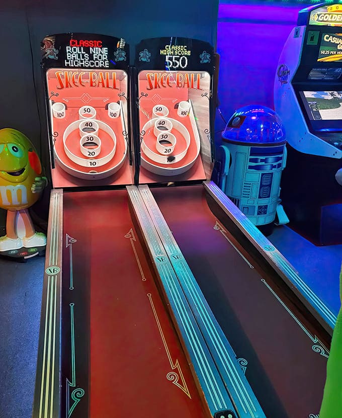 Skee-Ball lanes await your rolling prowess, their concentric targets practically begging for your carnival-game redemption story.