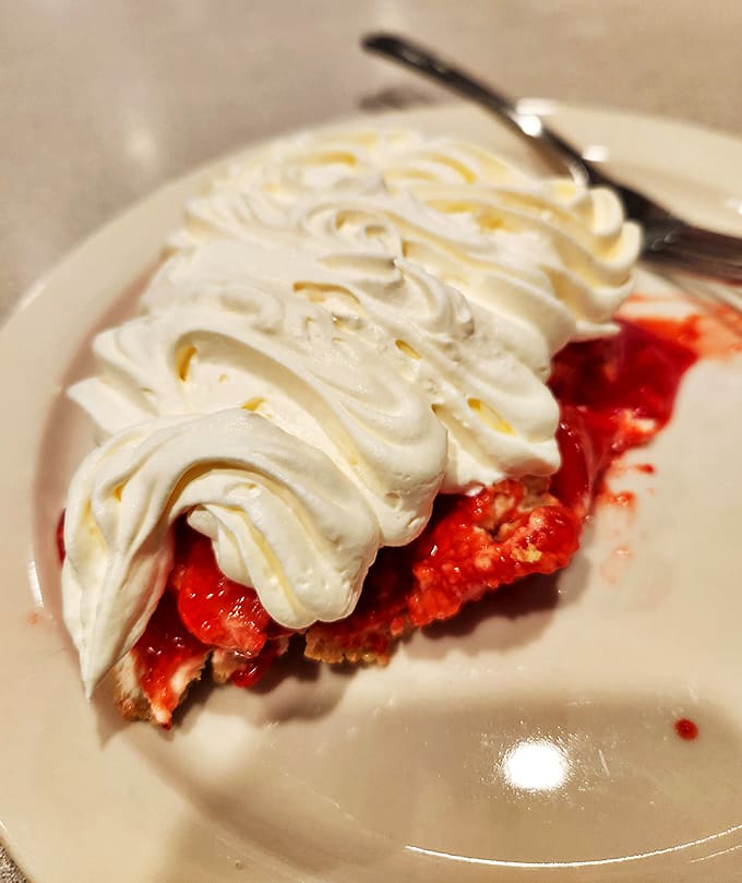 Strawberry pie that captures summer in every bite &ndash; the berries practically singing beneath that cloud of fresh whipped cream.
