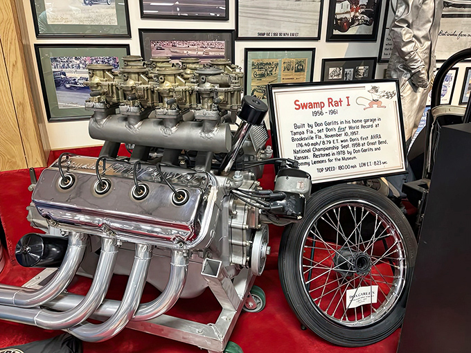 The legendary Swamp Rat I engine sits like automotive royalty, its exposed mechanical heart showing the raw power that changed drag racing forever.