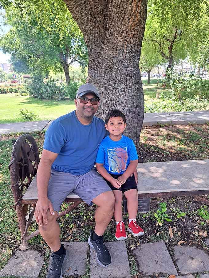 Generations connect over shared beauty as visitors discover that roses speak a universal language everyone understands, regardless of age.