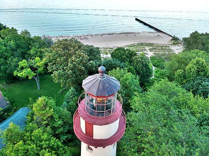 From above, the lighthouse complex reveals its perfect symmetry, with manicured paths leading to this maritime marvel that seems delightfully out of place in Illinois.