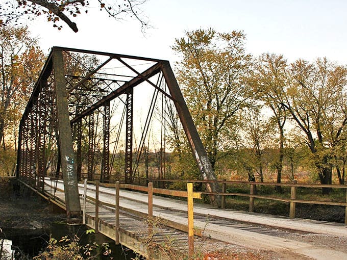 As twilight approaches, the bridge takes on a different character, silhouetted against the fading light of day.