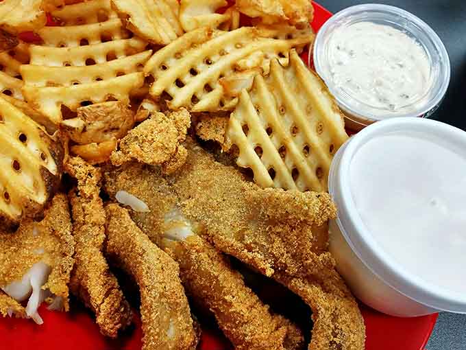 Crispy walleye and waffle fries &ndash; Midwest comfort food that proves sometimes the simplest pleasures are the most satisfying.