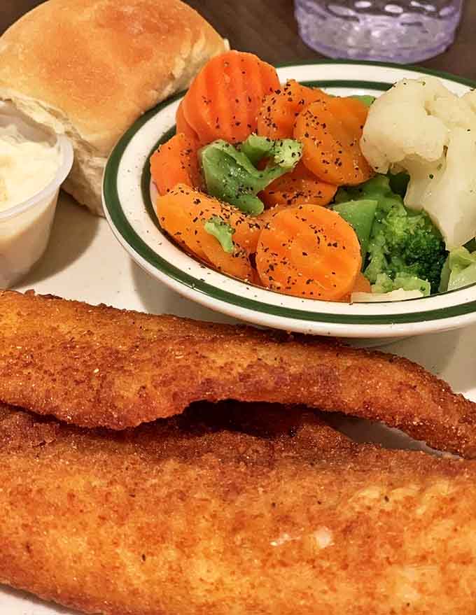 The walleye dinner with fresh vegetables proves fish this fresh doesn't need fancy preparation &ndash; just respect and butter.
