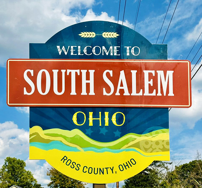 This unassuming welcome sign greets visitors with Midwestern modesty, promising authentic small-town experiences rather than tourist trappings.