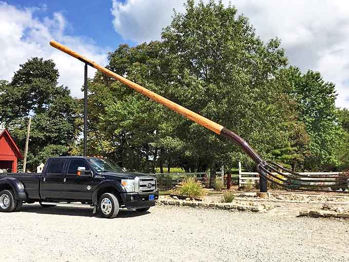 Even full-sized pickup trucks look like toy cars when parked next to this colossal creation.