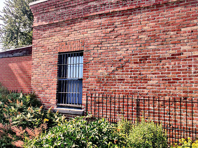 Original barred windows maintain the jail's authentic character while framing views of small-town Wykoff &ndash; freedom is just a glance away!