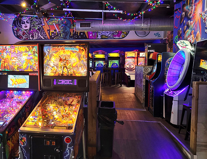 Row upon row of arcade cabinets, each one a time machine disguised as a game, waiting to transport you back to simpler times.