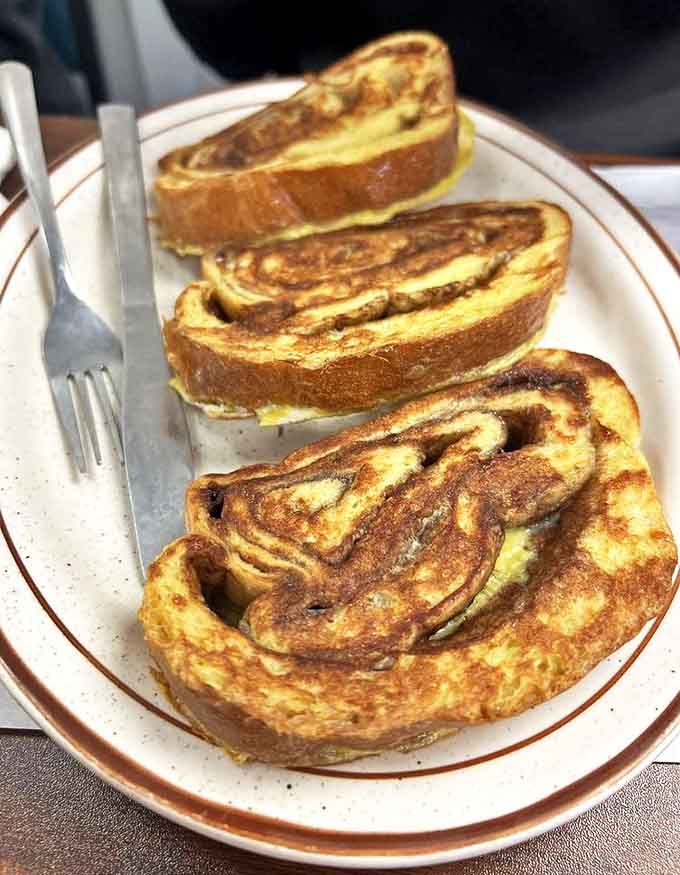 Cinnamon French toast that makes you question why anyone would eat regular bread again. Breakfast or dessert? Yes.