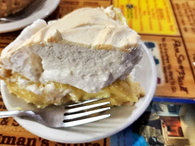 The coconut meringue pie stands tall and proud &ndash; a cloud-like topping over creamy coconut filling that transports you to tropical bliss.