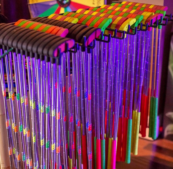 Choose your weapon! These aren't just putters &ndash; they're magic wands that transform ordinary golfers into neon-lit champions of the course.