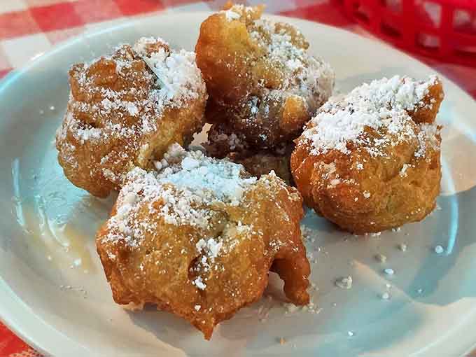Sweet meets savory in these powdered sugar-dusted corn fritters &ndash; crispy, fluffy little clouds that disappear from plates with magical speed.