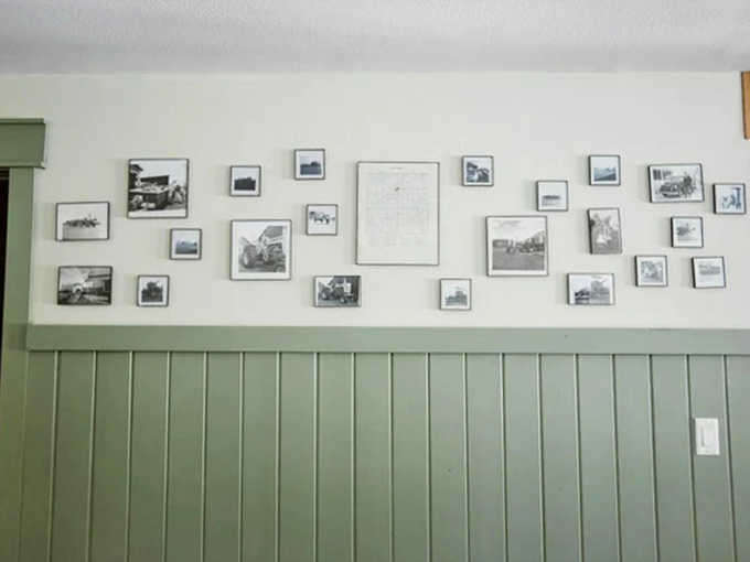 A gallery wall of black and white photographs tells stories of yesteryear, connecting guests to the rich history of the region.