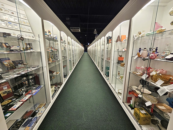 The glass corridor &ndash; display cases line this aisle like a museum of miniature treasures, each shelf holding potential finds for the eagle-eyed collector.