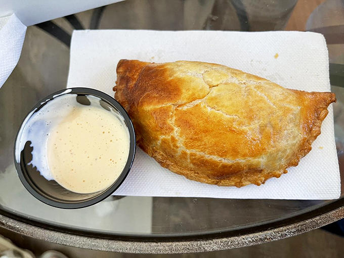 That dipping sauce isn't optional&mdash;it's essential. The creamy companion to your empanada adventure adds the perfect tangy counterpoint to the rich filling.