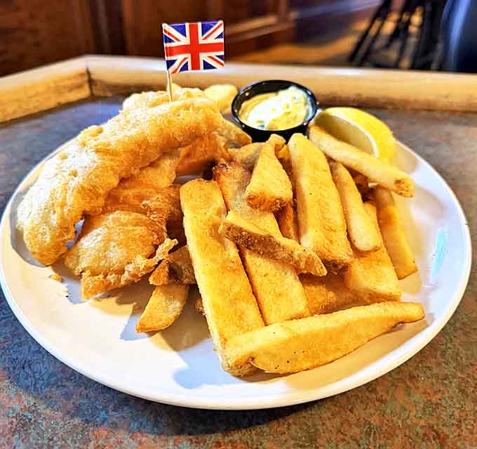 Fish and chips with a cheeky British flag &ndash; the perfect marriage of golden-battered cod and crispy fries that would make London proud.