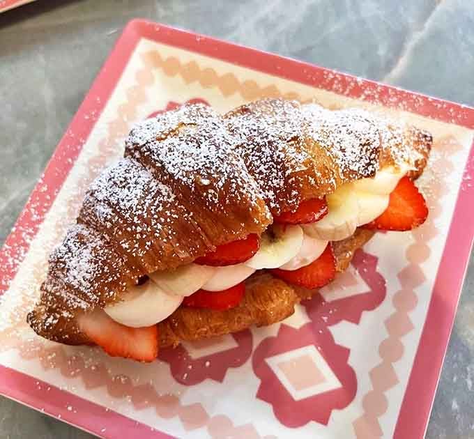 This fruit-filled masterpiece transforms the humble croissant into a celebration, with every bite offering a different delicious note.