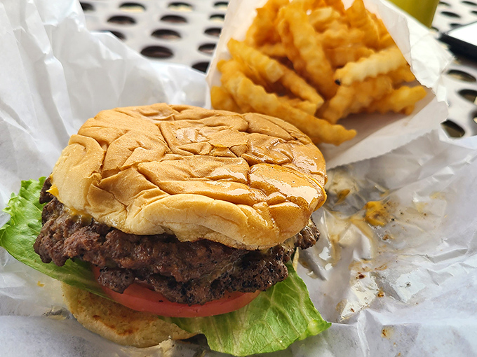 A classic diner-style burger with crispy crinkle fries&mdash;simple, satisfying comfort food done right.