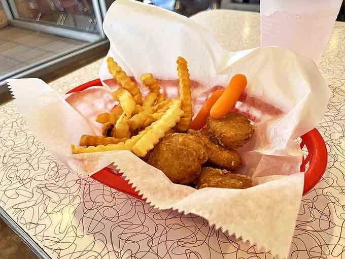 Chicken nuggets and fries become an adventure when they arrive via locomotive, turning ordinary kid food into something worth remembering.