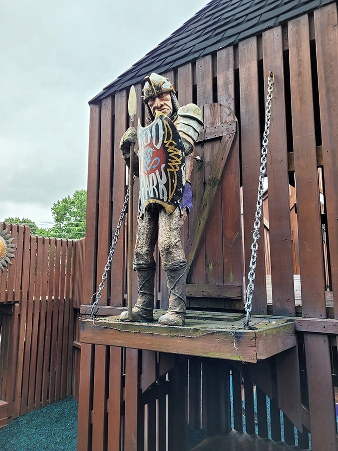 This medieval knight stands eternal guard, his weathered appearance suggesting countless adventures and battles fought for honor.