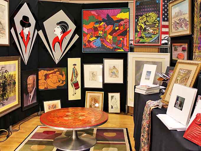 A gallery wall of vintage art creates a time-traveling visual feast, from mid-century abstracts to elegant portrait studies.