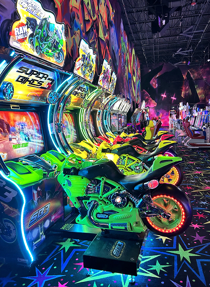 Motorcycle simulators that let you lean into digital curves without the road rash. The neon backdrop makes every ride feel like Tron meets Fast & Furious.