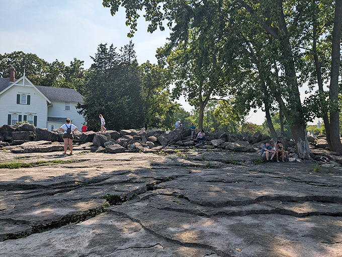 Nature and history collide where massive rocks meet Lake Erie's waters – the same rugged shoreline that necessitated this lighthouse two centuries ago.