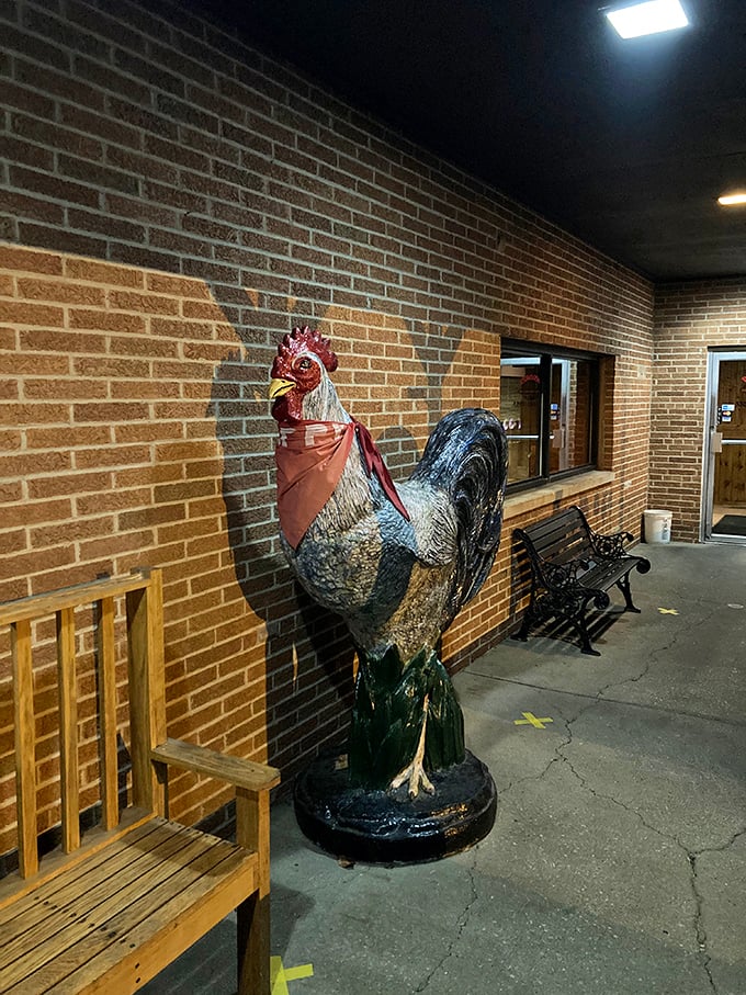 The guardian of good taste! This rooster statue stands sentinel outside, silently judging those who pass by without stopping for chicken.