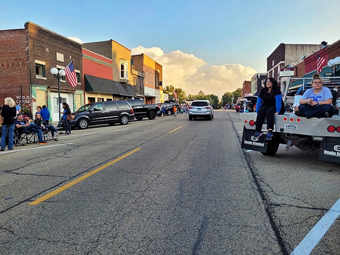 Sunset transforms Main Street into a Norman Rockwell painting come to life, where lawn chairs replace theater seats for the evening's entertainment.