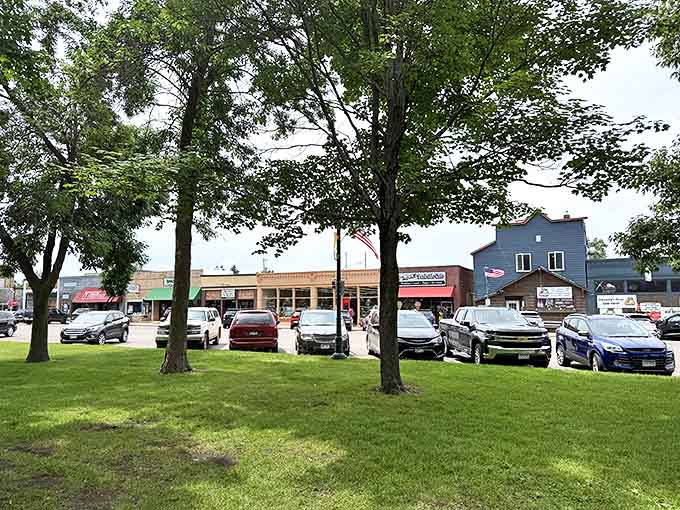 Pine City's welcoming downtown invites exploration, with shade trees and storefronts that promise discoveries around every corner.
