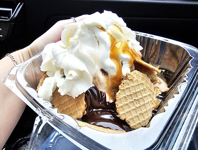 A sundae that demands to be photographed before it's devoured &ndash; layers of vanilla, chocolate, caramel, and wafers creating a skyscraper of sweetness.