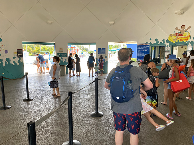 Families line up at the entrance, that unique mix of excitement and sunscreen application that signals the start of a proper summer day.