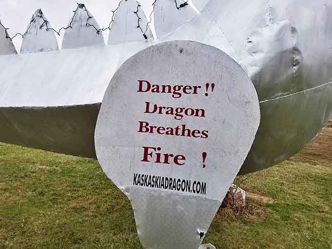 "Danger!! Dragon Breathes Fire!" warns the sign, building anticipation for the fiery display that awaits token-bearing visitors.