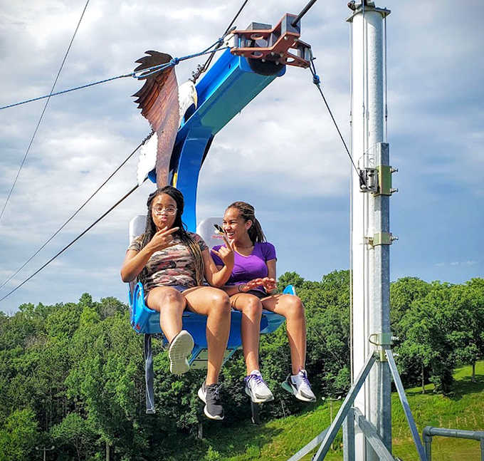 The waiting line becomes its own social experience, where strangers bond over shared excitement and friendly competition.
