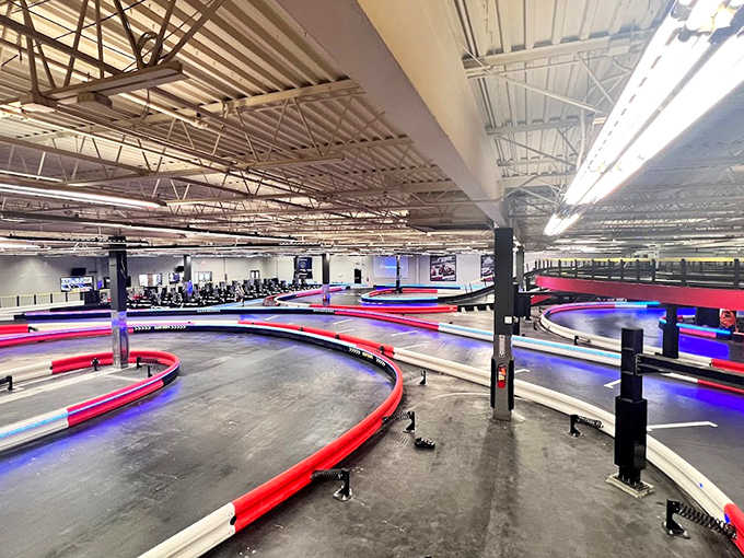 The spacious interior combines industrial chic with racing aesthetics, creating an atmosphere where speed enthusiasts immediately feel at home.