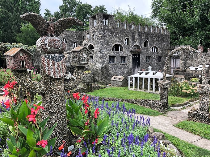 Colorful flowers complement the intricate stonework in this hidden gem, where every path leads to new discoveries and delightful details.