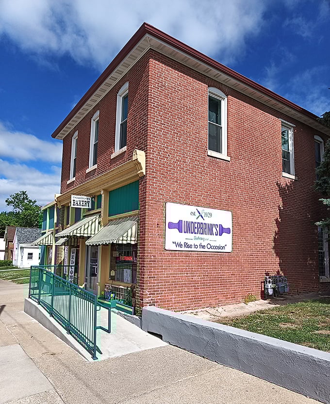 Underbrink's Bakery's historic brick building with green awnings embodies small-town charm. This Quincy institution looks frozen in a sweeter time.