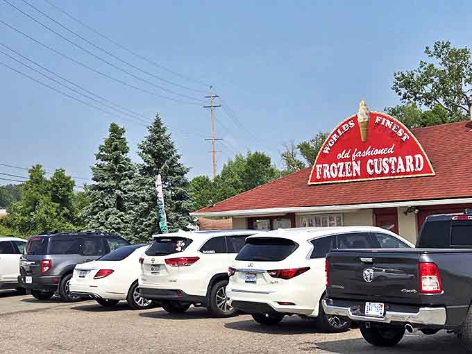 World's Finest Frozen Custard's classic roadside stand draws crowds of cars on sunny Michigan days. The simple red-roofed building houses custard worthy of its bold name.
