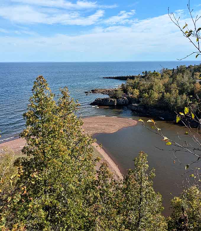 Lake Superior stretches to the horizon from the Gitchi Gummi Trail, proving that Minnesota's natural beauty extends far beyond its famous waterfalls.