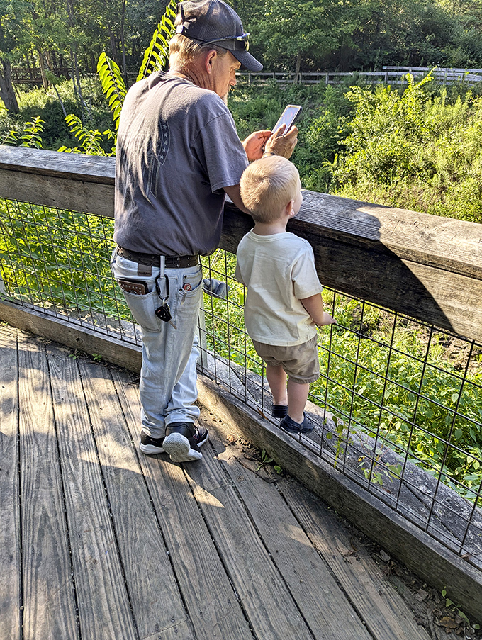 Generations connecting through nature&mdash;proof that sometimes the best screen time happens when looking at something that isn't digital.