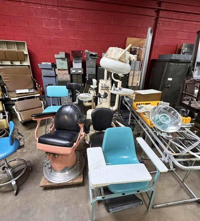 A quirky collection of vintage medical gear, where old dentist chairs whisper questionable tales.