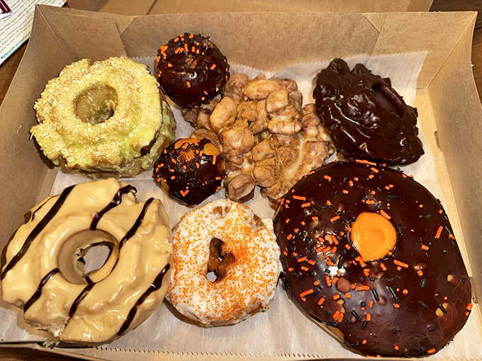 A box of assorted donuts represents hope, joy, and the fleeting nature of perfection&mdash;they'll be gone by noon, both from the shop and your box.