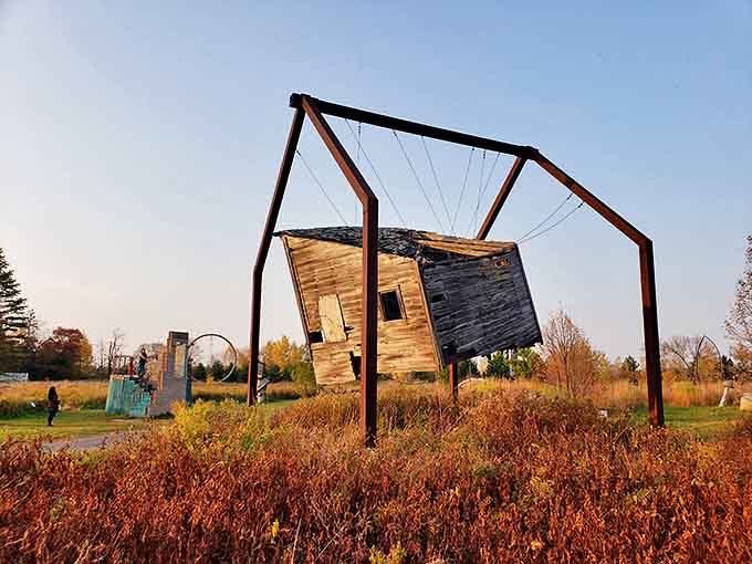 Autumn transforms Franconia into a canvas of warm colors, with the suspended house appearing to float among fall's golden hues.