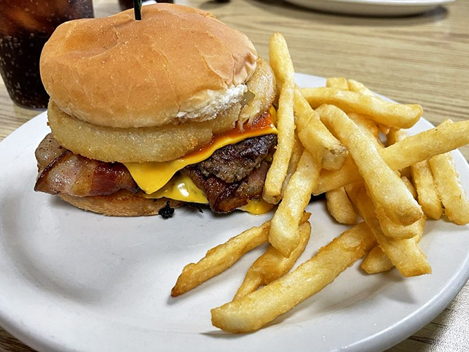 A bacon cheeseburger that doesn't need fancy aioli or artisanal buns &ndash; just honest beef, melty cheese, and bacon that means business.