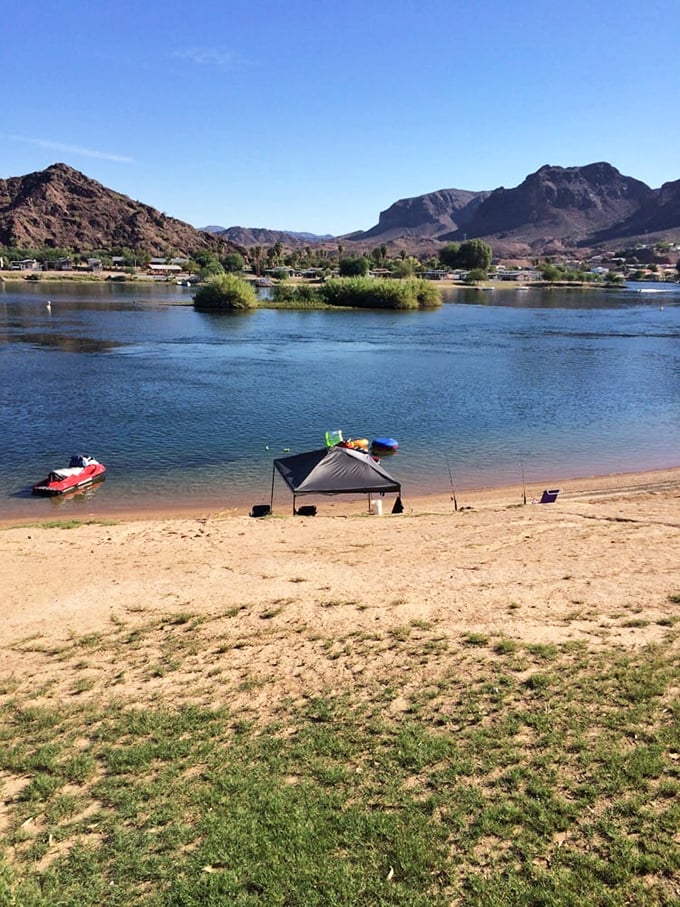 Beachfront relaxation, complete with shade canopies and fishing poles waiting for the next big catch.