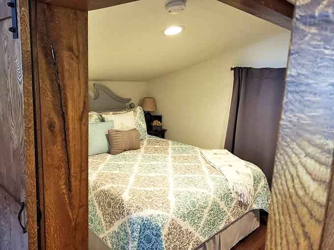 Drift into dreamland in this cozy bedroom sanctuary where quality linens and soft pillows promise the deep sleep that only country air delivers.