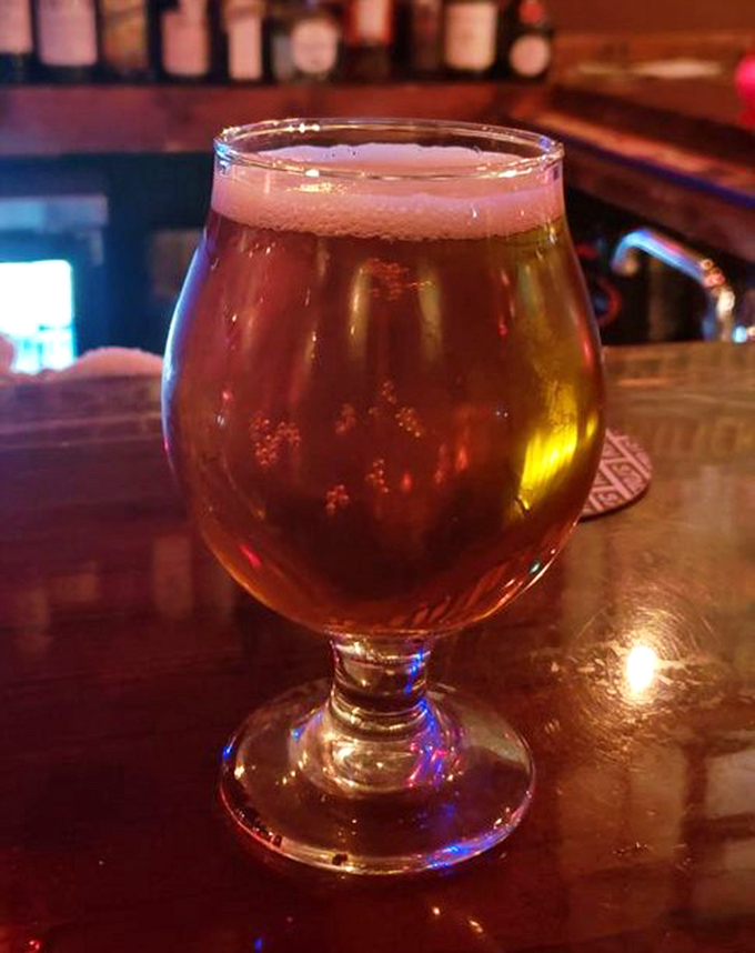 Amber nectar in proper glassware &ndash; because even adventurers deserve their beverages served with respect and care.